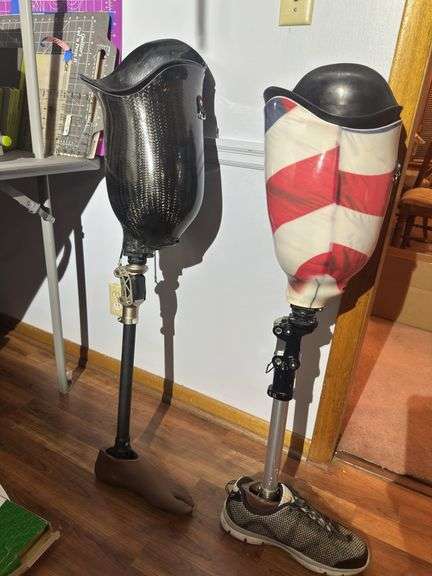 Two left foot prosthetic legs - Auction Ohio