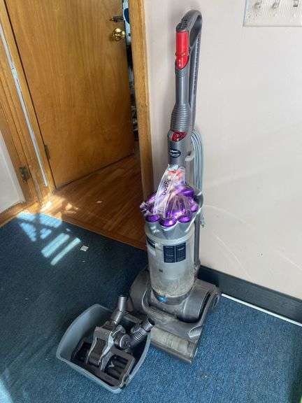 Dyson upright vacuum with two attachments - Auction Ohio