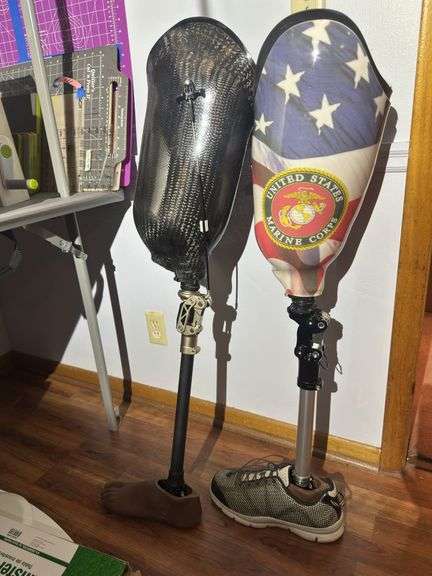 Two left foot prosthetic legs - Auction Ohio