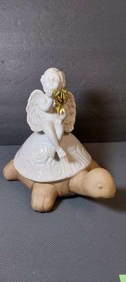 Angel ridding on the back of a Turtle. (Separate Items) Looks Cute ...