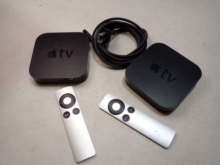 TWO APPLE TV BOXES W/REMOTES & 1 CORD - Auction Ohio