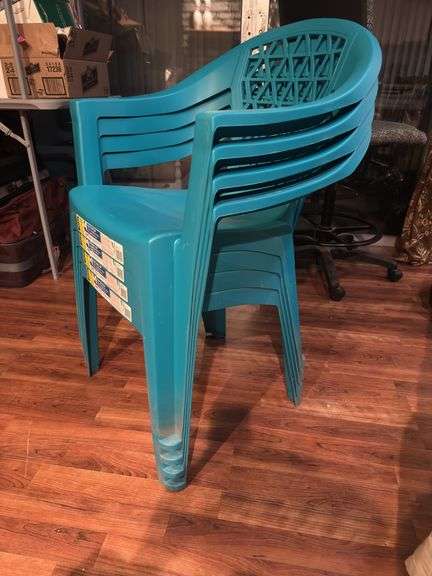 Teal stackable chairs - Auction Ohio