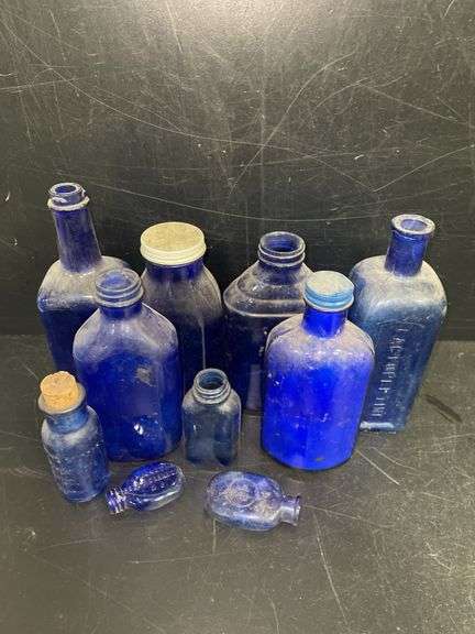 Blue Elixir bottles - Auction Ohio