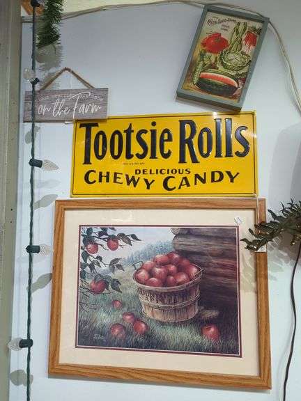 Light and Tootsie Roll metal sign - Auction Ohio