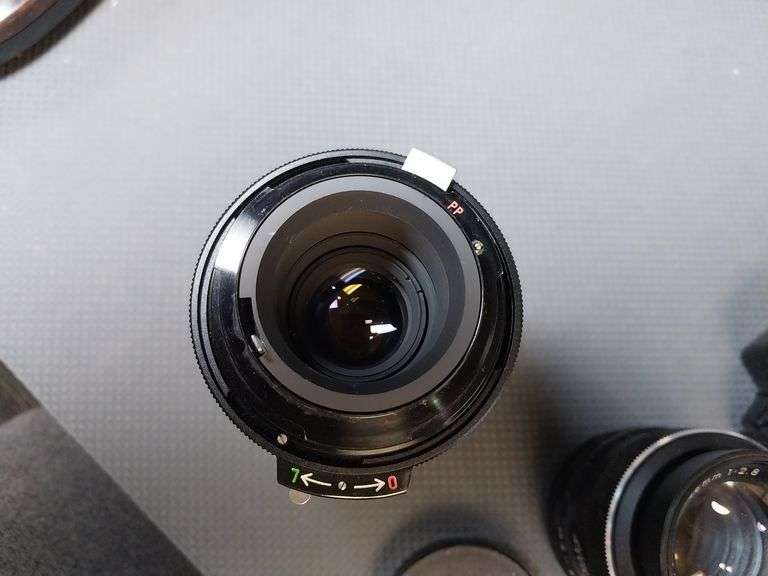 Camera Lens, Flash Units + - Auction Ohio