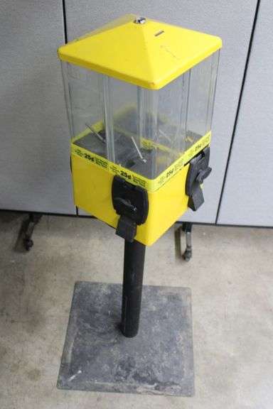 Dual-Compartment Yellow Coin-Operated Vending Machine on Metal Stand ...
