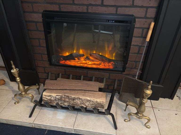 Brass Andirons and Cast Iron Firewood Rack - Auction Ohio