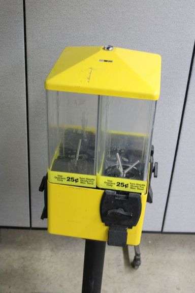 Dual-Compartment Yellow Coin-Operated Vending Machine on Metal Stand ...
