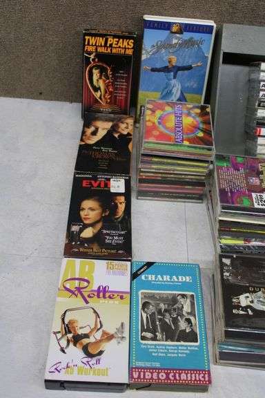 Assorted Collection of CDs, VHS Tapes, and Cassette Tapes with Sony HF ...
