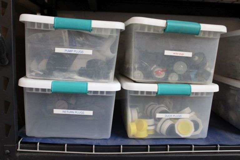 Assortment of Plugs in Labeled Storage Totes - Auction Ohio