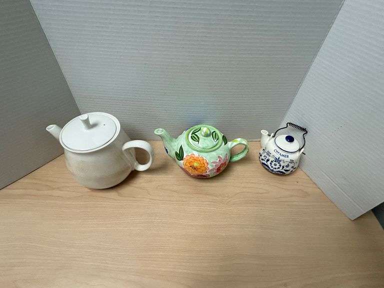 Trio of Teapots - Auction Ohio