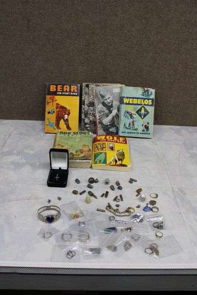 Collection of Boy Scout Books, Jewelry, Spent Bullet Casings, and ...
