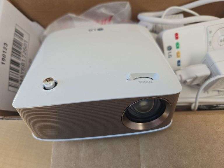 LG cine beam. - Auction Ohio