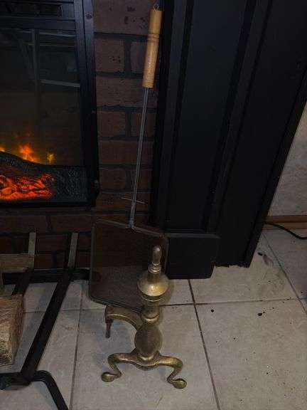 Brass Andirons and Cast Iron Firewood Rack - Auction Ohio