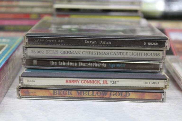 Assorted Collection of CDs, VHS Tapes, and Cassette Tapes with Sony HF ...