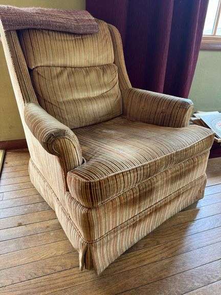 MCM Upholstered Swivel chair - Auction Ohio