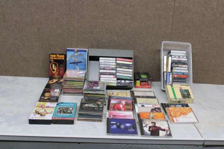 Assorted Collection of CDs, VHS Tapes, and Cassette Tapes with Sony HF ...