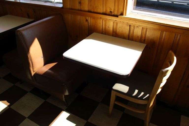 Restaurant Booth Seating with Attached Tables and Wooden Chairs ...