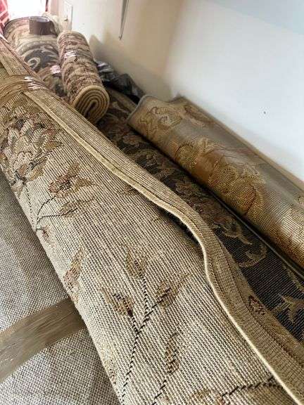 Collection of rolled rugs - Auction Ohio