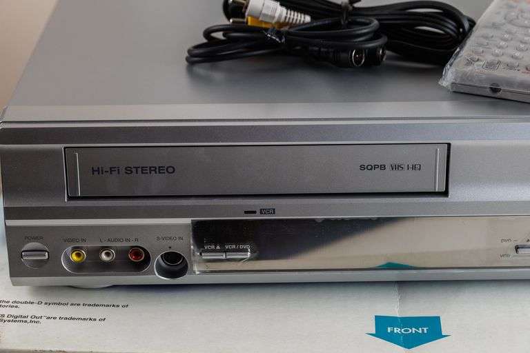 VHS and DVD Player Combo- New in Box - Auction Ohio