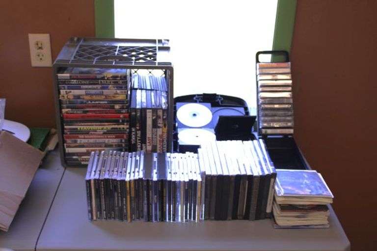Collection of DVDs, CDs, and PC Video Games in Various Cases - Auction Ohio