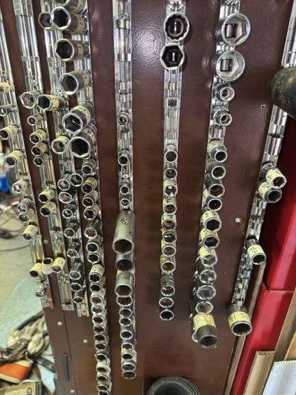 Sockets (bring screwdriver still on cabinet) - Auction Ohio