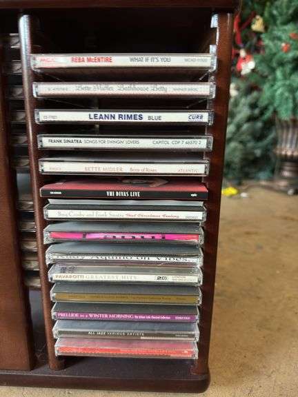 Wood CD spinner with cd’s - Auction Ohio