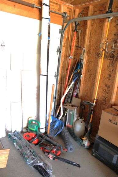 Garage Lot Including Yard Tools, Wire Fencing, and Power Equipment ...