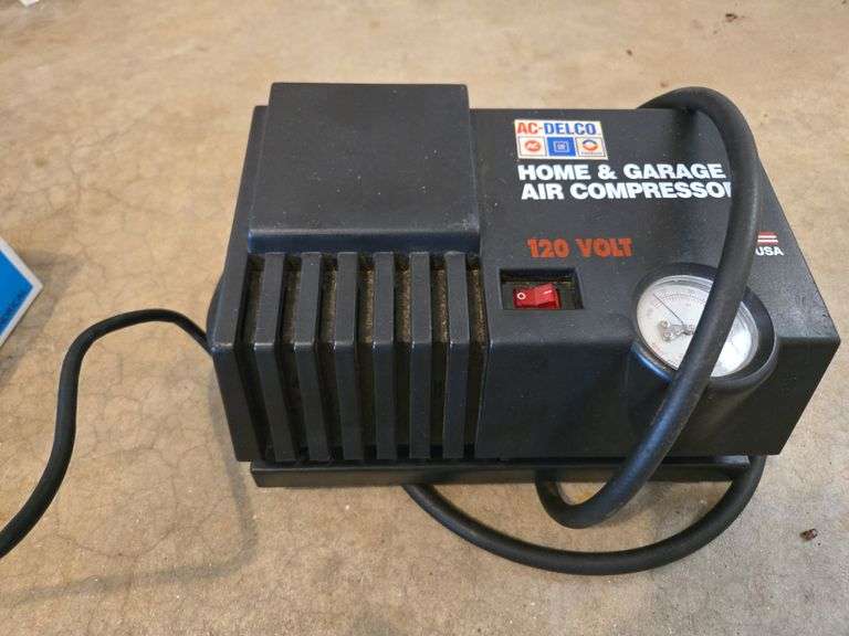 A c delco portable air compressor - Auction Ohio