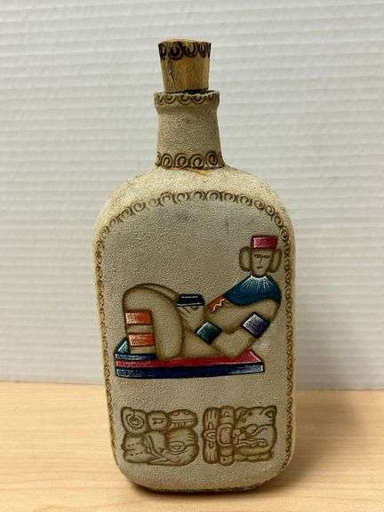 Leather Wrapped Bottle - Auction Ohio