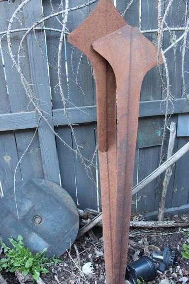 Pair of Rusted Metal Decorative Spire Sculptures - Auction Ohio