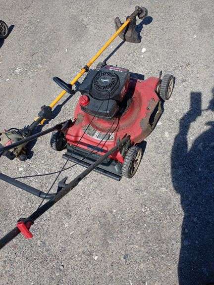 Yard machine push mower with string trimmer - Auction Ohio