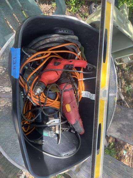 Tote of tools and cords - Auction Ohio