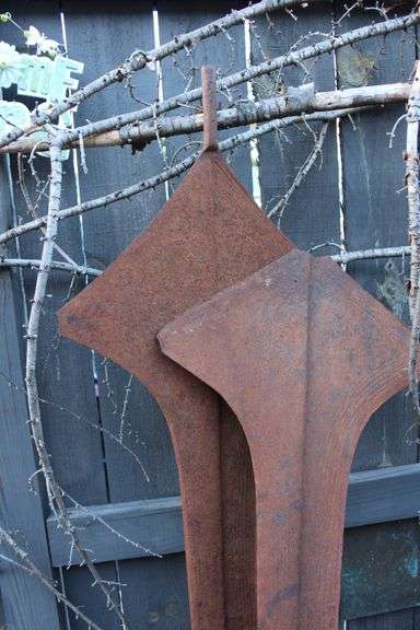 Pair of Rusted Metal Decorative Spire Sculptures - Auction Ohio