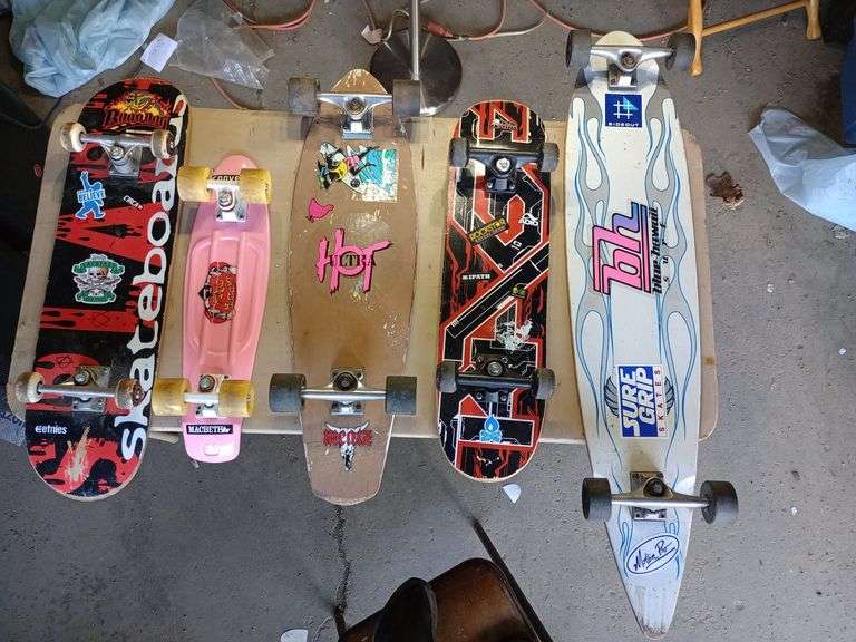 Five vintage skateboards ranging from the '80s through early 2000s ...
