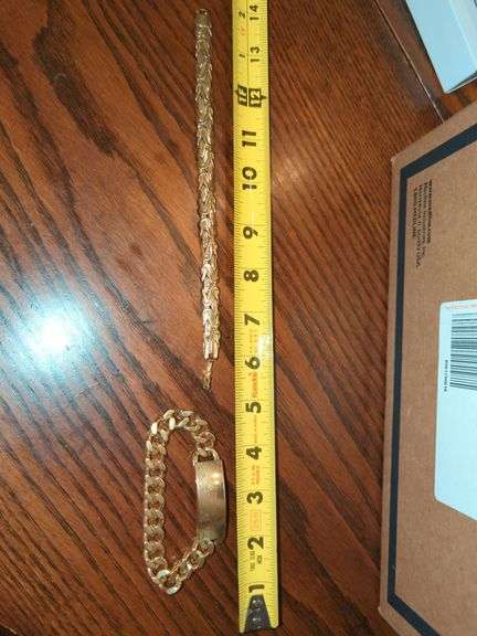 Champion id bracelet, gold chain - Auction Ohio