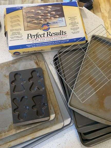 Mixed Size Baking Sheets And Wilton Cooling Racks - Auction Ohio