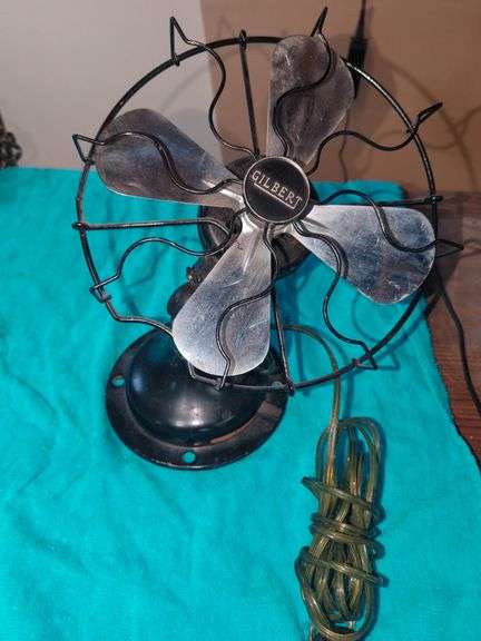 Gilbert Black and Silver Metal Fan - Auction Ohio