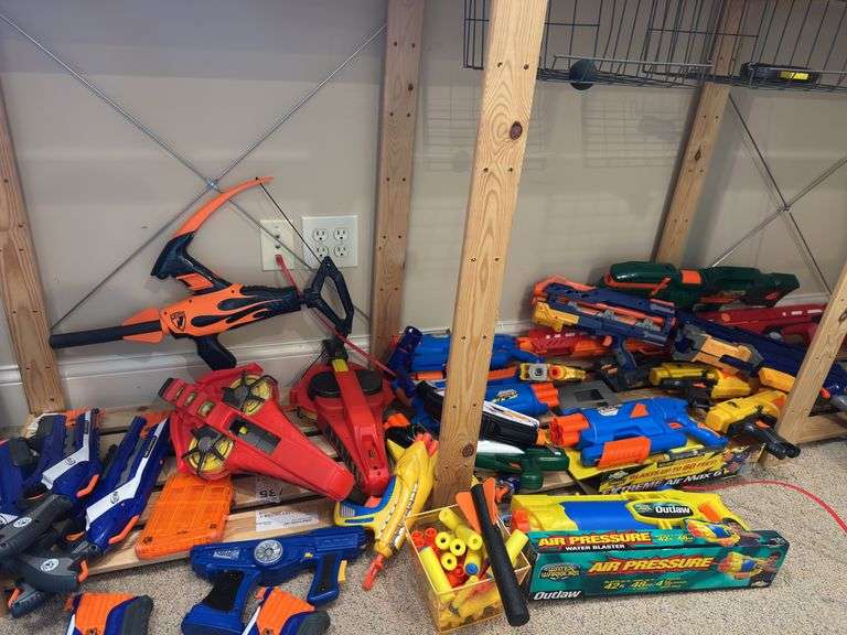 Shelf full of Nerf guns and more - Auction Ohio