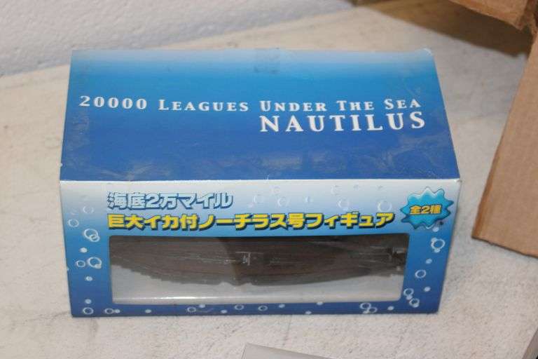 Nautilus Model & More - Auction Ohio