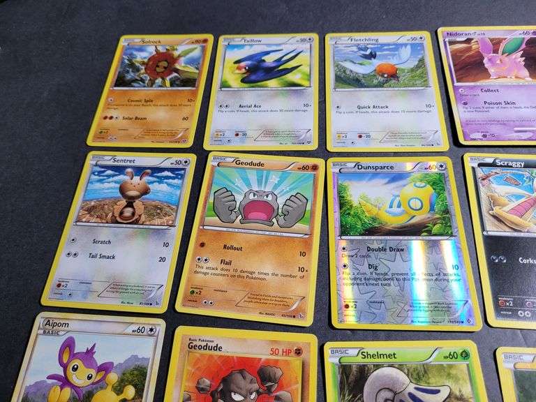 24 Pokémon Cards - Auction Ohio