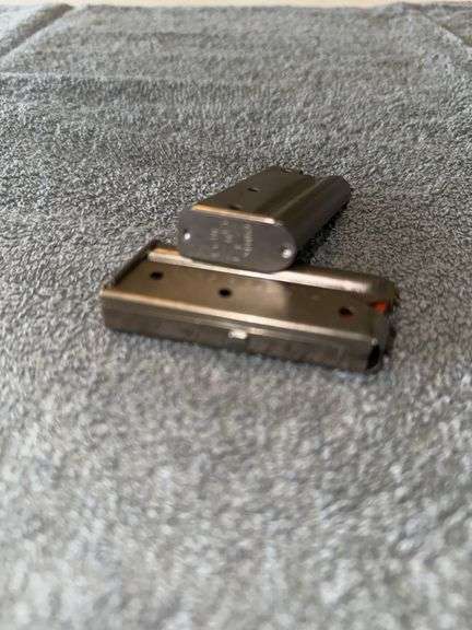 22LR stainless CLIPS 1 with AMMO, 1 without. - Auction Ohio