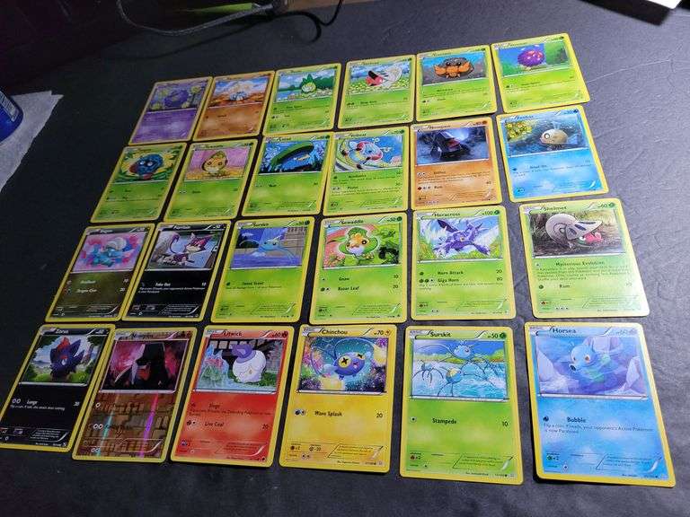24 Pokémon Cards - Auction Ohio