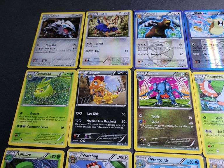 24 Pokémon Cards - Auction Ohio