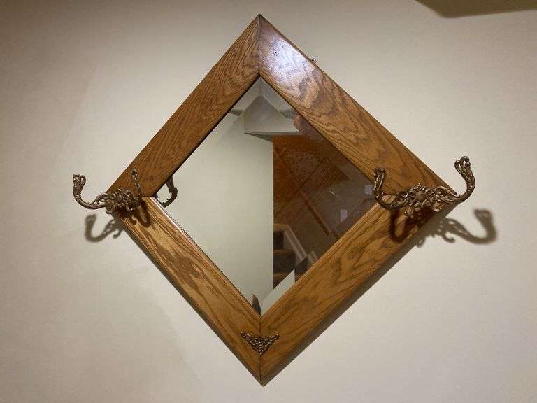 Vintage diamond shape wall mirror with hooks - Auction Ohio