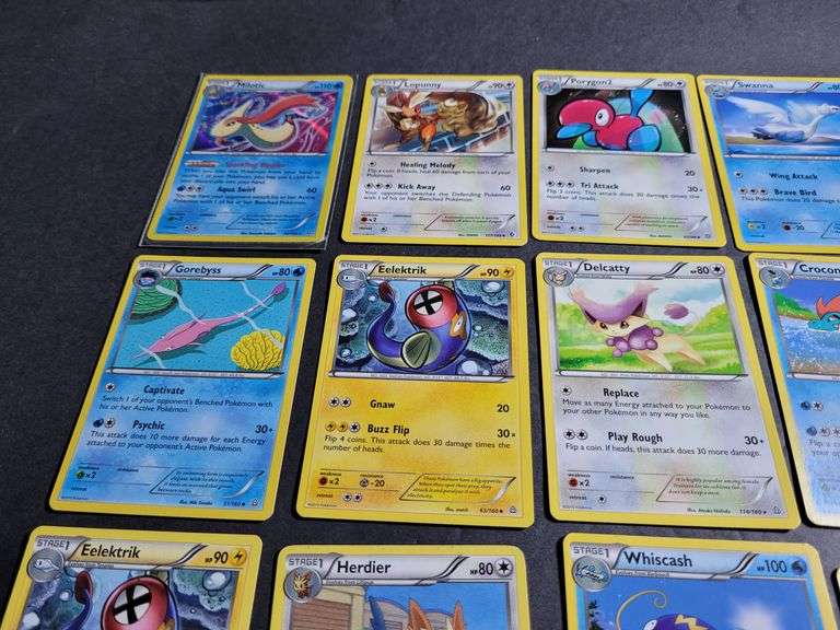 24 Pokémon Cards - Auction Ohio