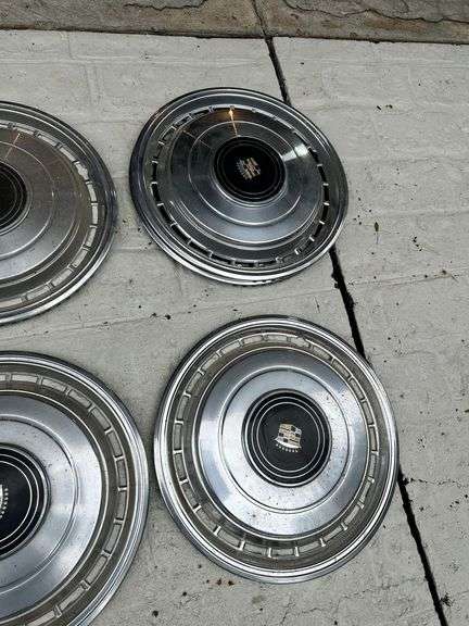 Set of 4 Cadillac Hubcaps - Auction Ohio