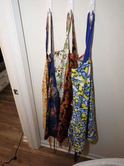Collection of Colorful Cooking Aprons - Auction Ohio