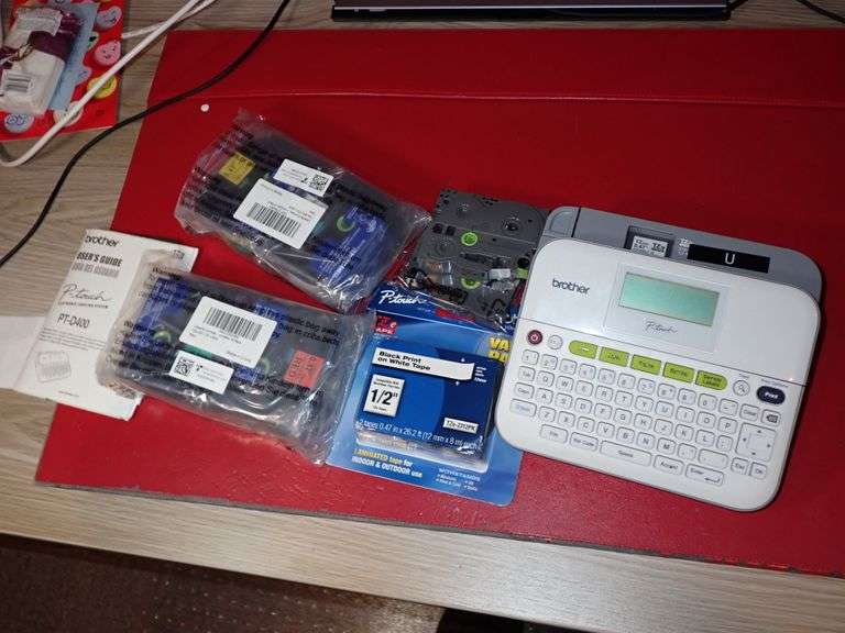 Brother P-touch Label maker w/ extra cartridges - Auction Ohio