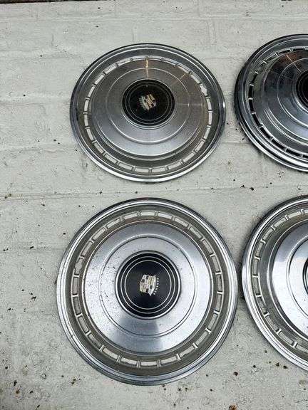 Set of 4 Cadillac Hubcaps - Auction Ohio
